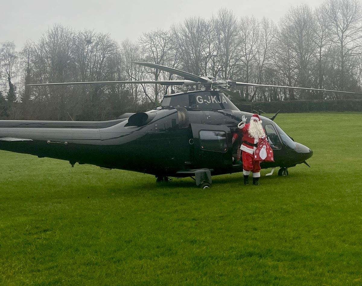 Hill View pupils buzzing after Santa arrives by helicopter - Banbury FM